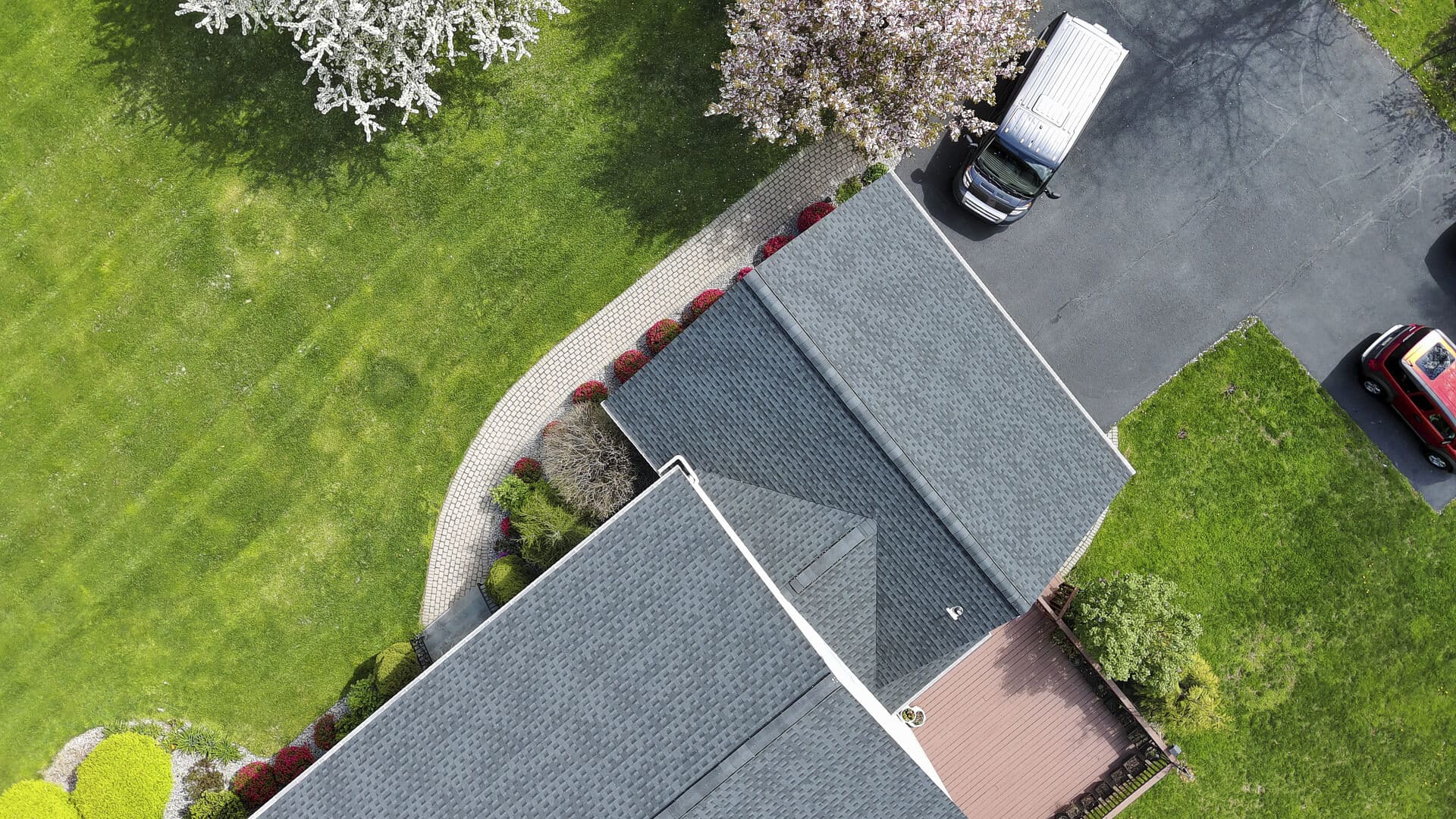 Do Flat Roofs Cost More Than Shingles? - American Home Contractors